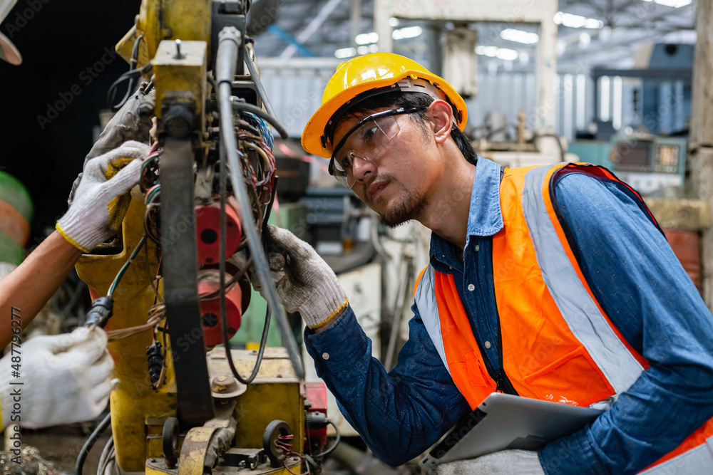 asian engineering worker man wearing uniform safety and hardhat working ...