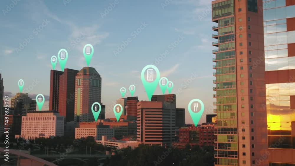 Pin markers showing points of interest on buildings in a city skyline ...