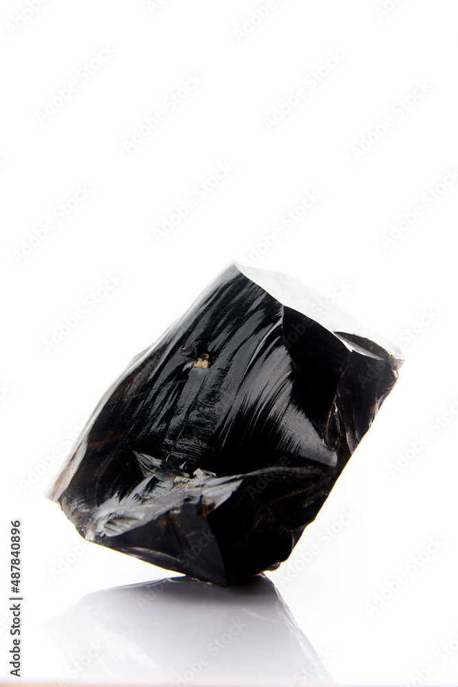 obsidian piece on white background Obsidian, sometimes called volcanic ...