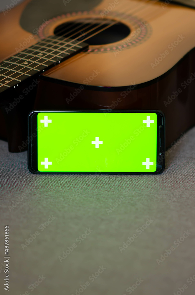 Selective focus on phone with greenscreen of chromakey mockup with ...