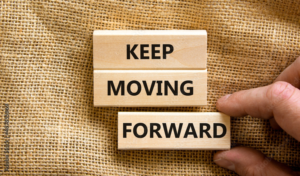 Keep moving forward symbol. Concept words Keep moving forward on blocks ...