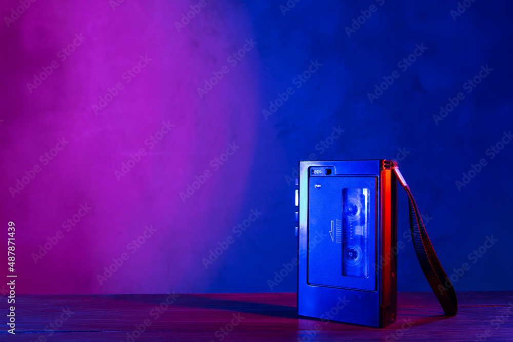 Vintage cassette tape player in neon light. 80s - 90s advertisement ...
