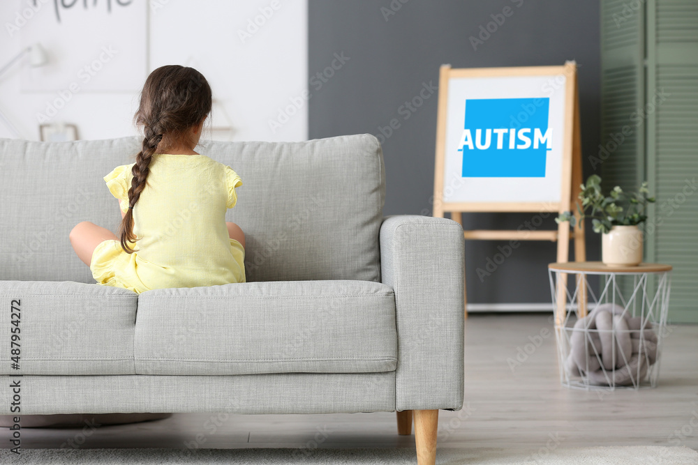 Sad little girl with autistic disorder at home, back view. World Autism ...