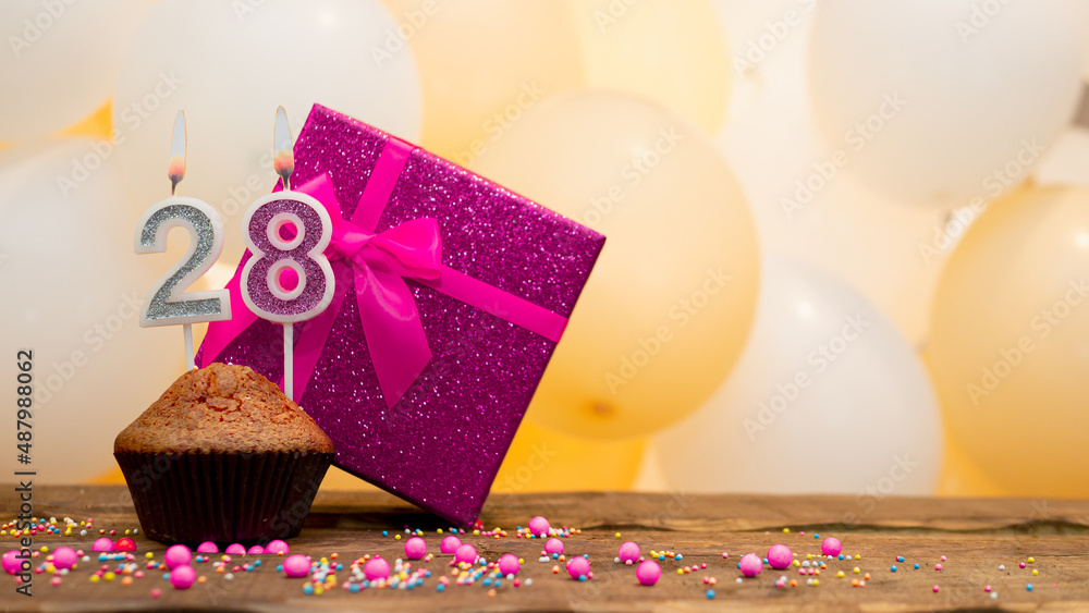 Happy birthday with a pink gift box for a 28 year old girl. Beautiful ...