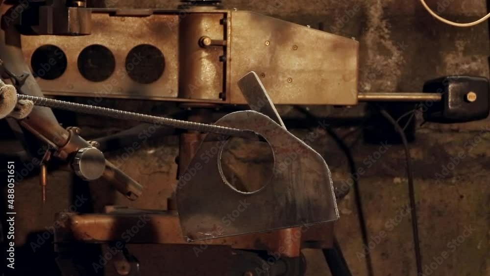 Grinding of parts on the machine. The turner shows a new part. Stock ...