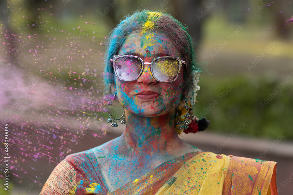 Holi festival of color, Splashing dry organic color or colour or gulal ...