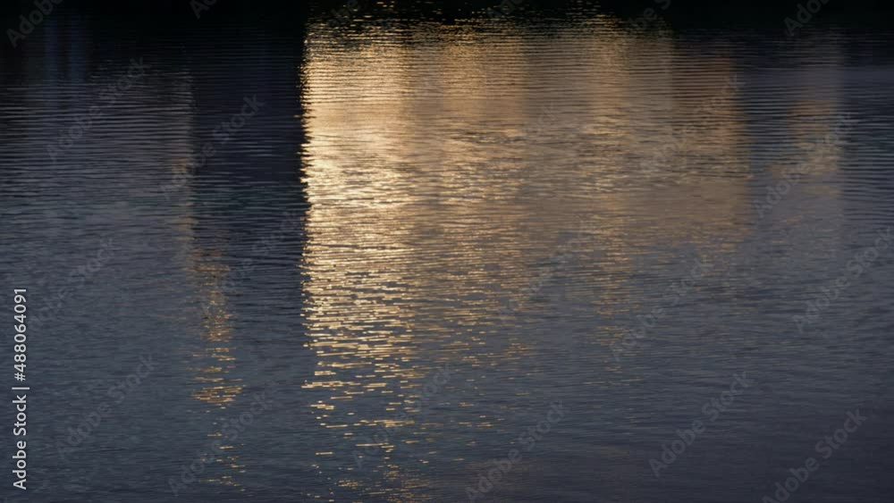 Rippled river water flowing at calm pace drone shot. Glaring waterway ...