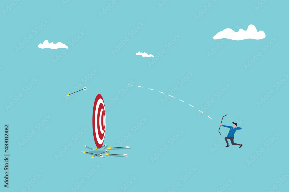 ailing to hit the target. Man desperately trying to shoot arrows with ...