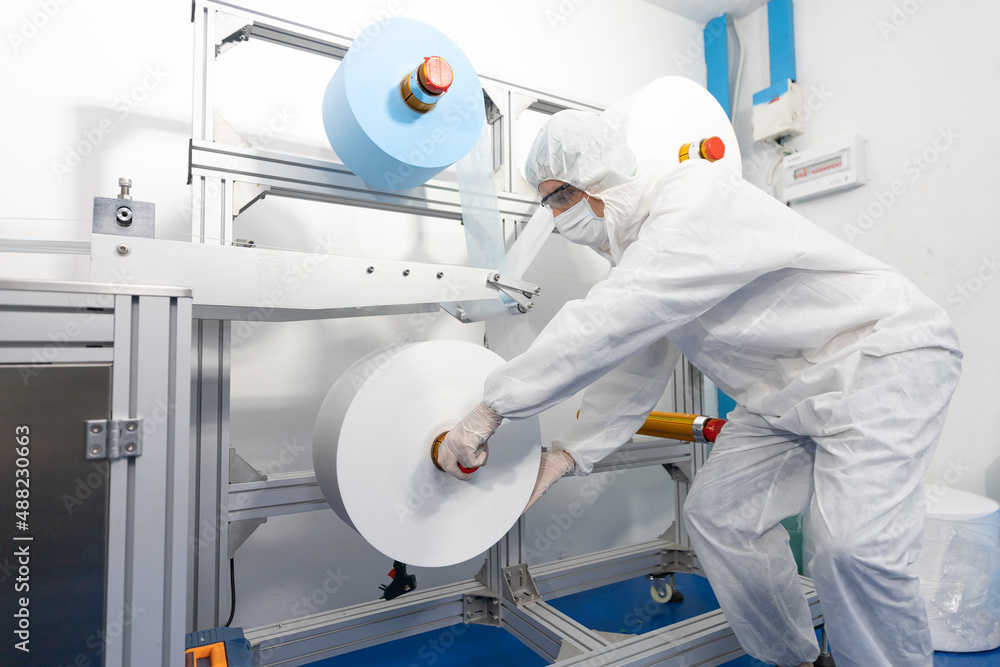 male engineers wearing personal protective equipment uniform(PPE) and ...