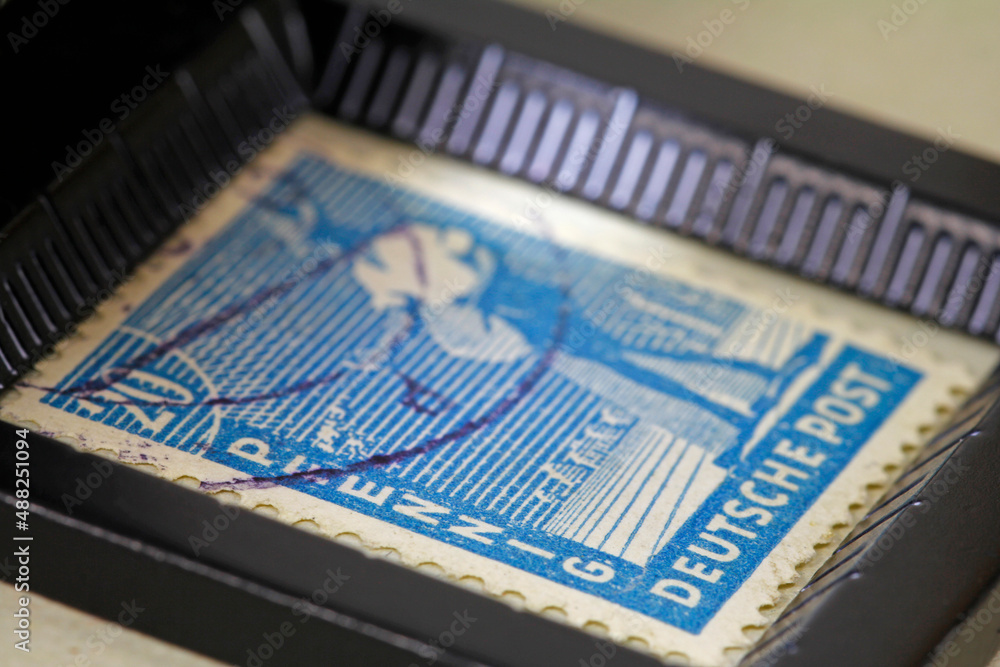 Blue German post office stamp Stock Photo | Adobe Stock