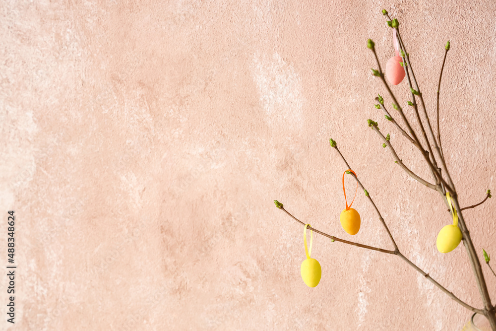 Tree branches with Easter eggs on color background Stock Photo | Adobe ...