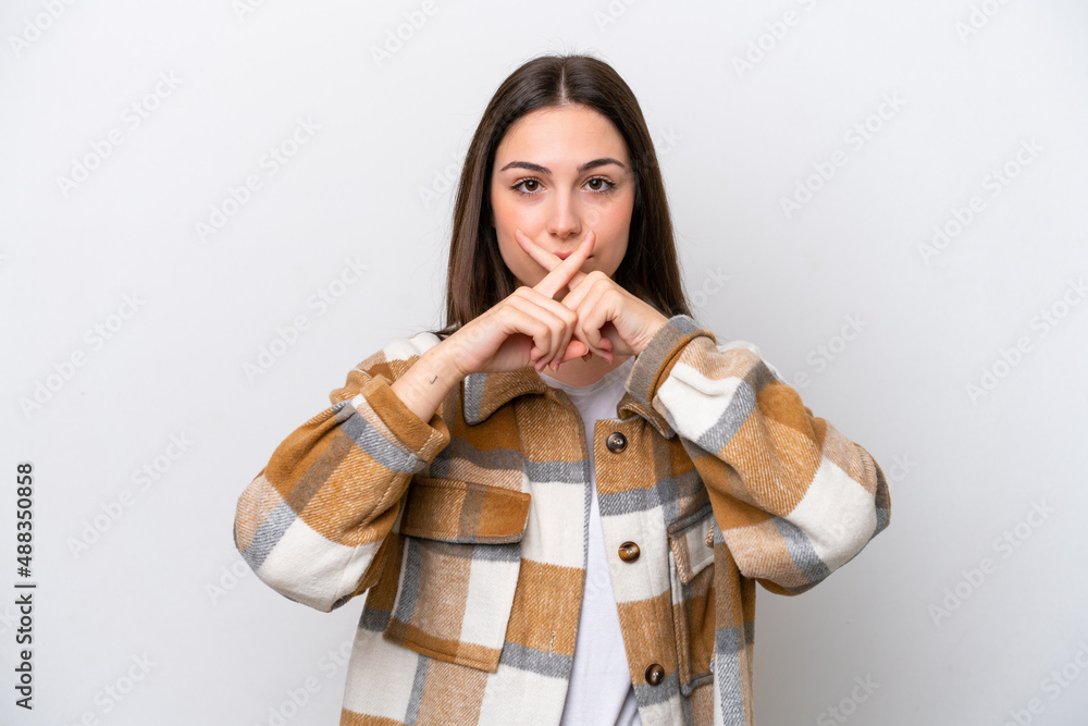 Young girl isolated on white background showing a sign of silence ...
