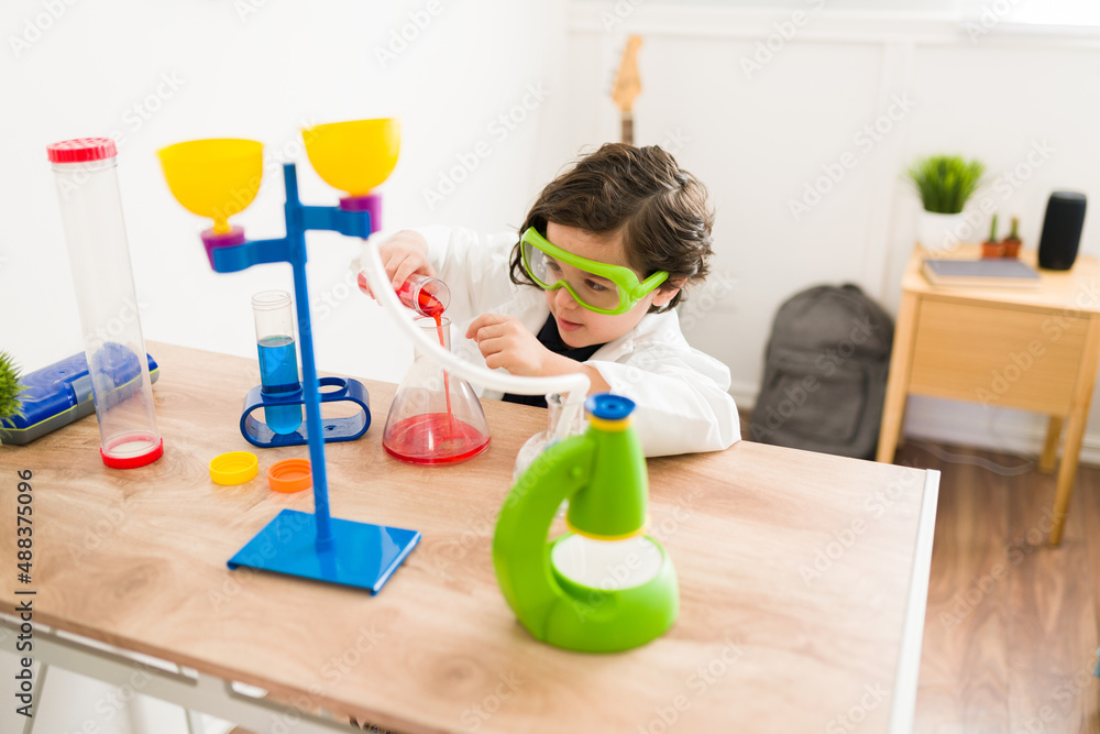 Cute child dreaming of being a scientist Stock Photo | Adobe Stock