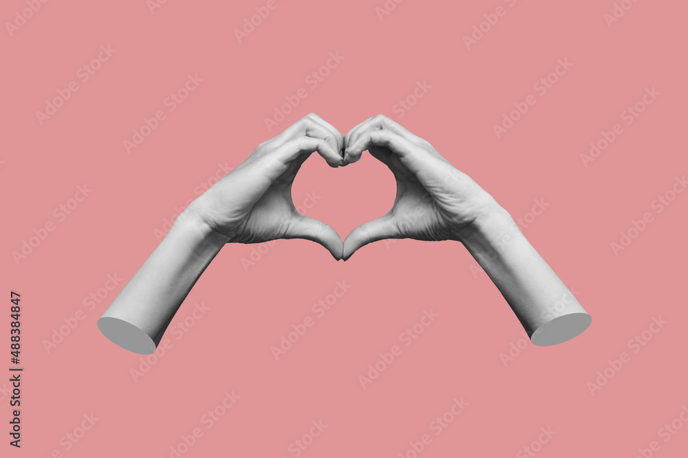 Human female hands showing a heart shape isolated on a pink color ...