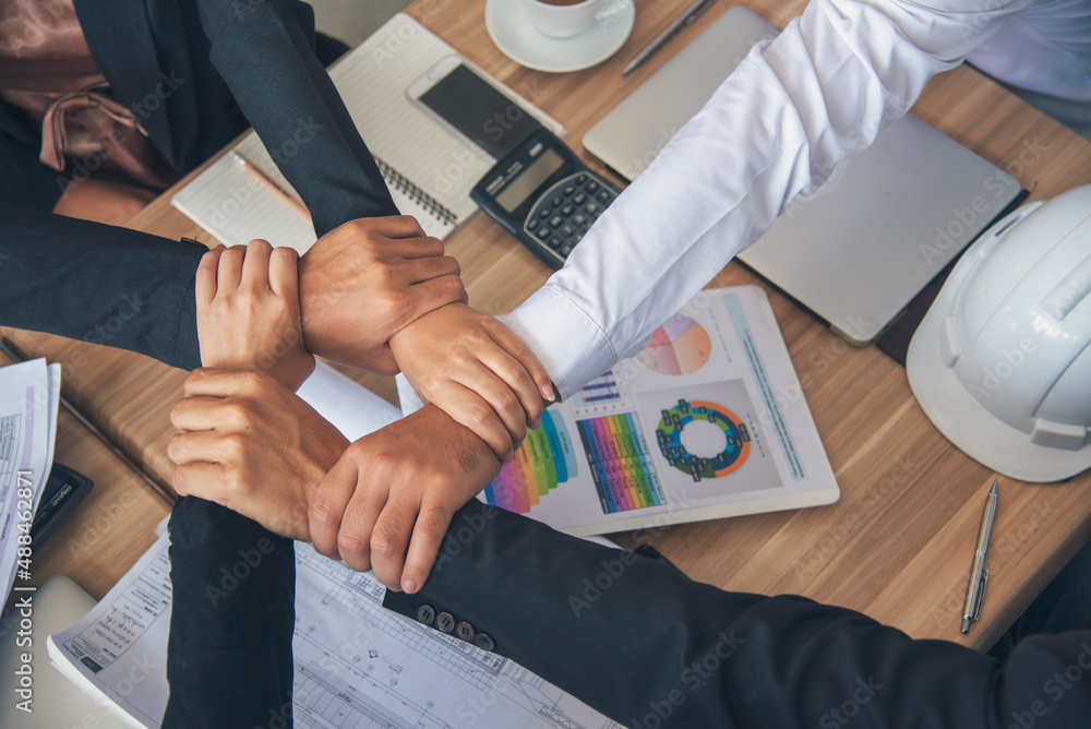 Partners hands together teamwork group of business people meeting in ...