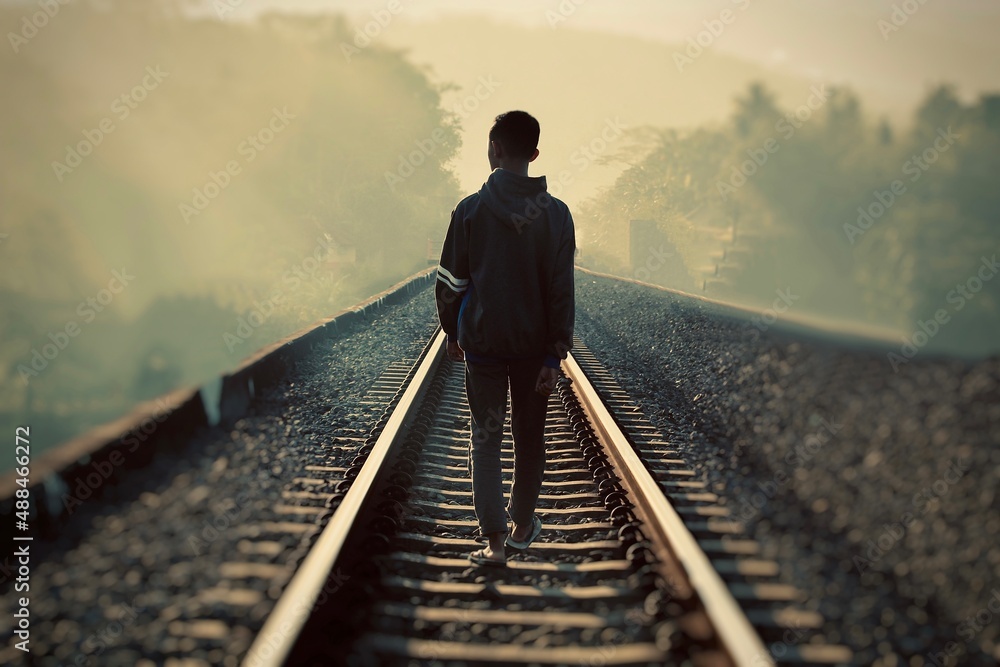 Alone Boy In Railway Track