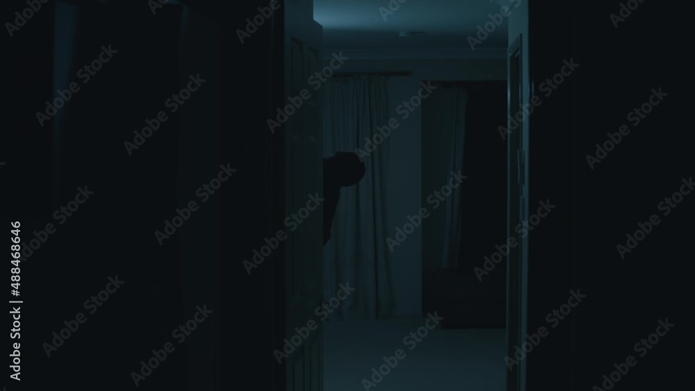 A dark, deformed figure creeps from around a corner and begins ...