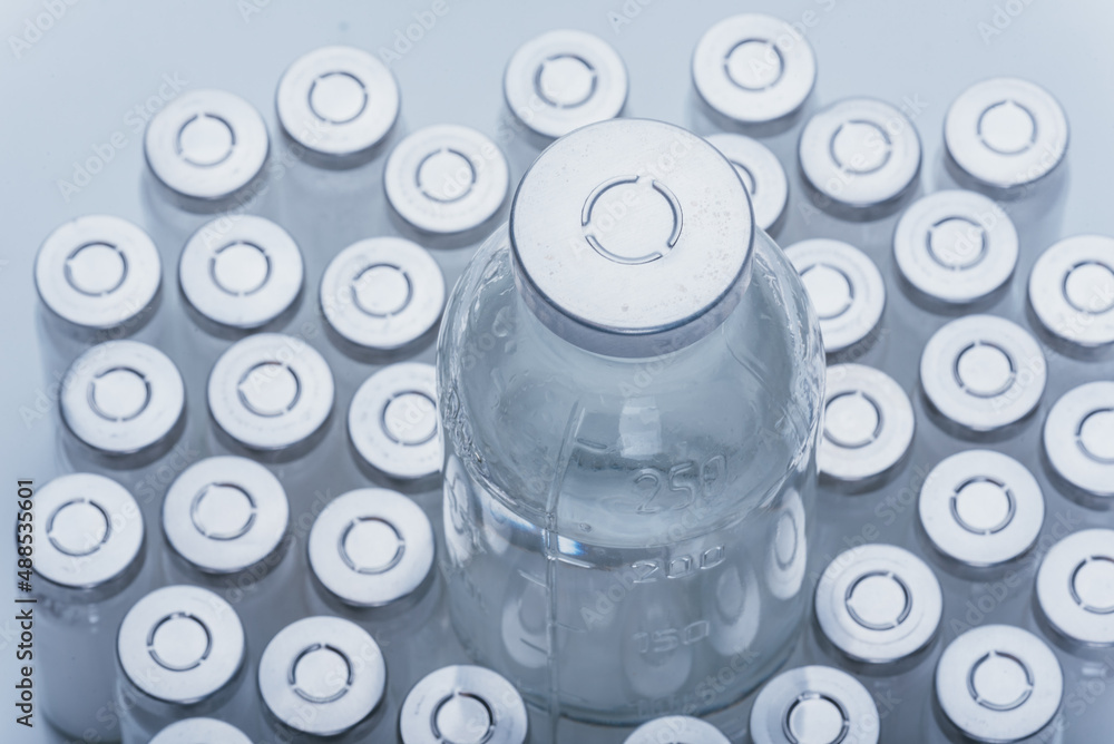 Glass medical ampoule vial for injection. Medicine is dry white drug ...