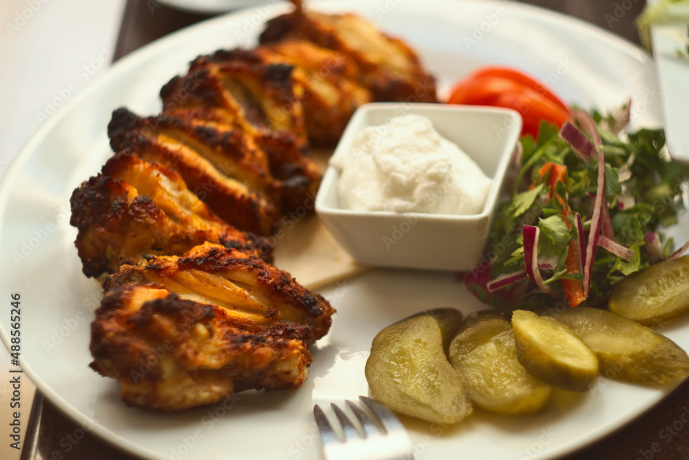 Syrian grilled chicken wings with coriander, garlic and lemon (jawaneh ...
