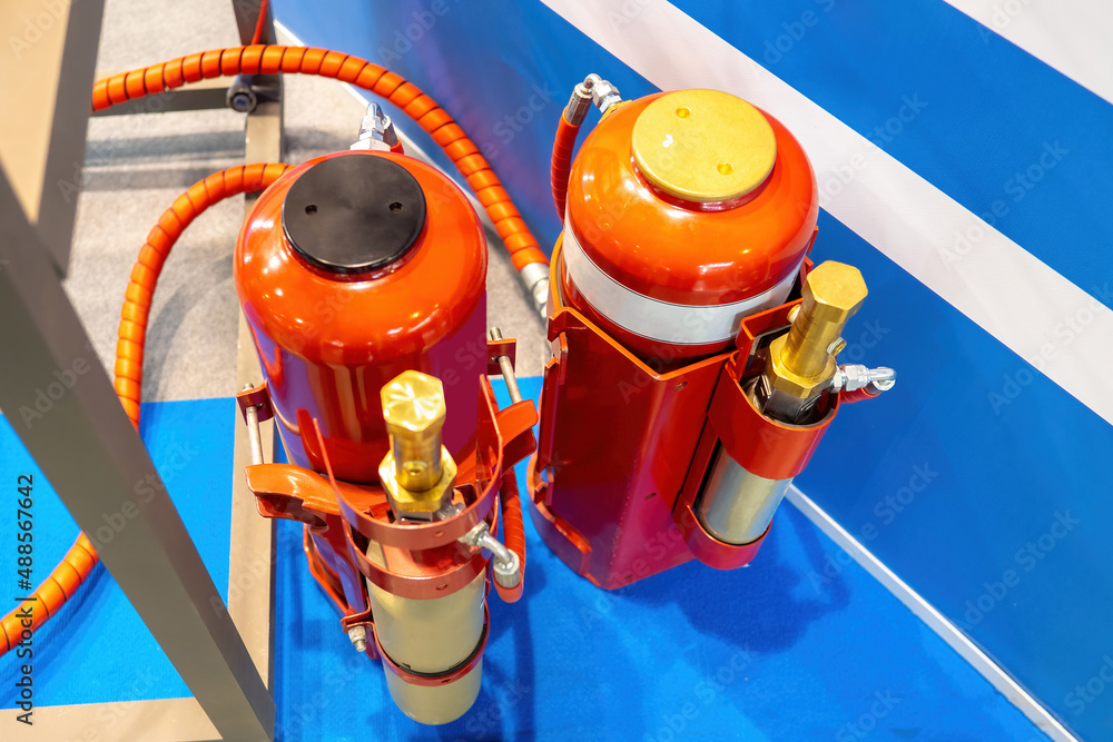 Flame extinguishing equipment. Specialized fire extinguishers in metal ...