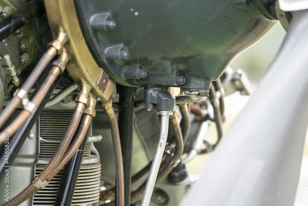 Close-up at WWII fighter plane engine and system part. Industrial and ...