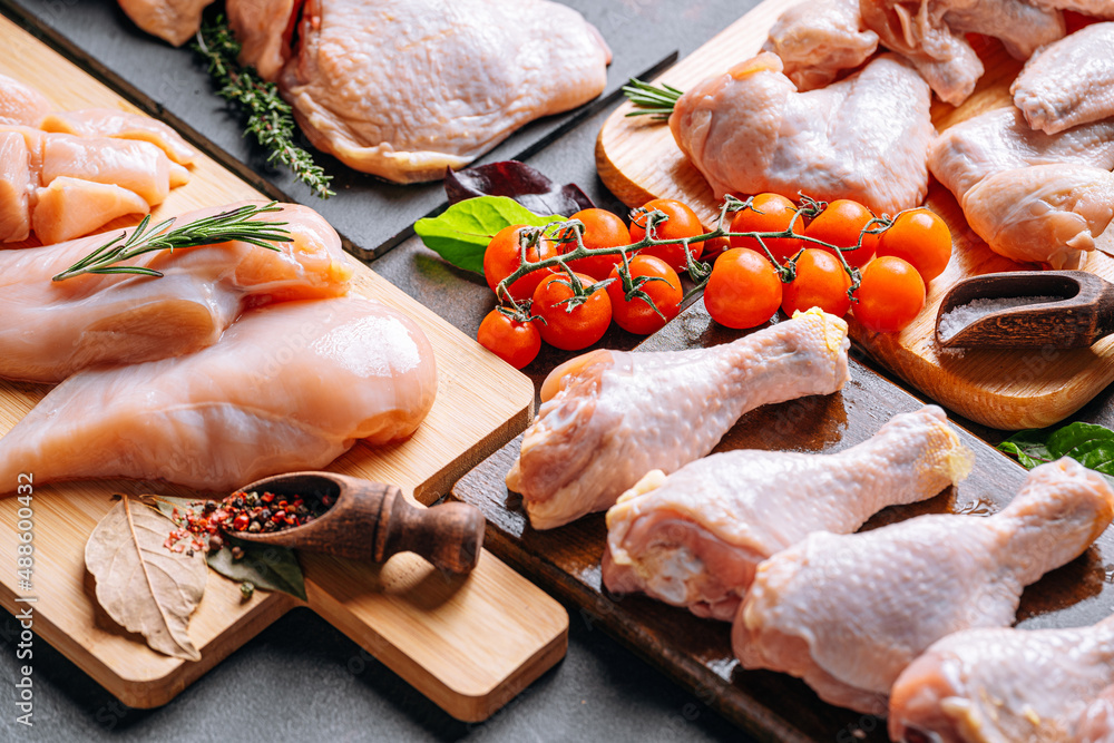 Prepared for frying, butchered various portions of raw chicken meat ...