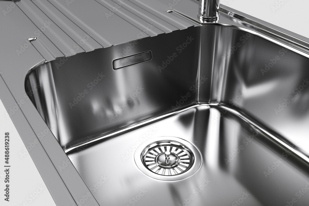 Metal sink kitchen sink close up. Drain water with grate in shiny ...
