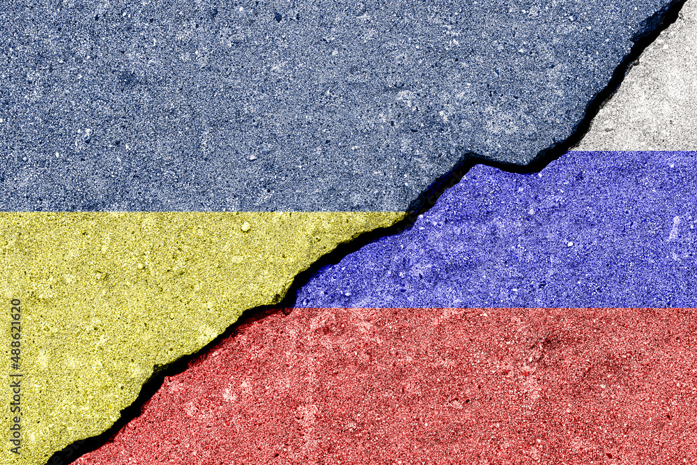 The crack between the Russian Federation and Ukrainian flags on the ...