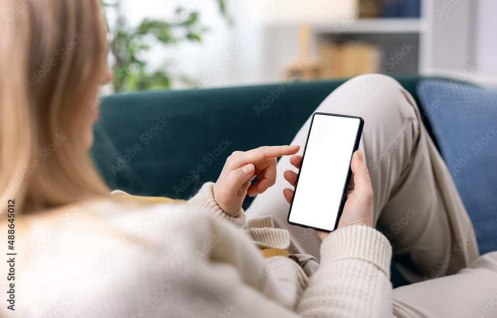 Over shoulder view of caucasian woman tapping with finger on empty ...