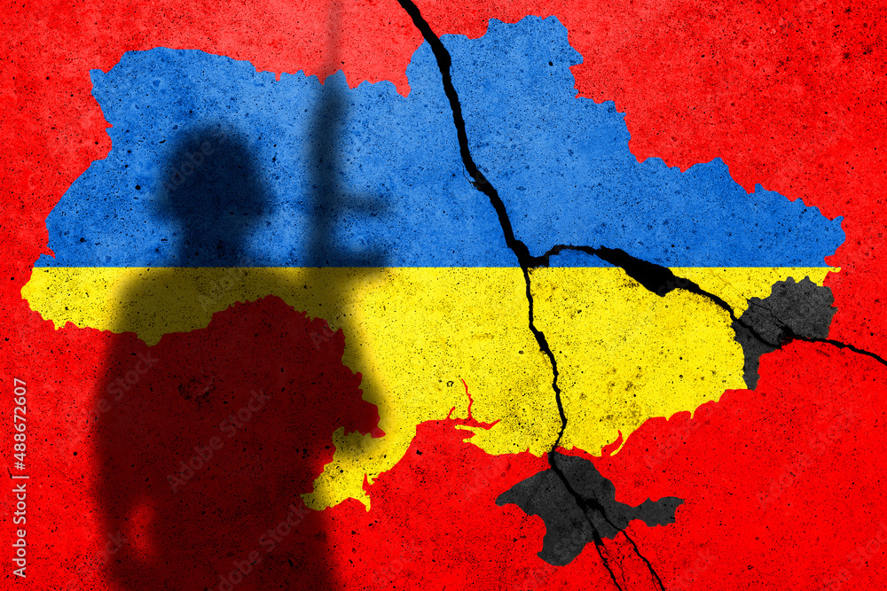 Flag map of Ukraine painted on a concrete wall with occupied ...