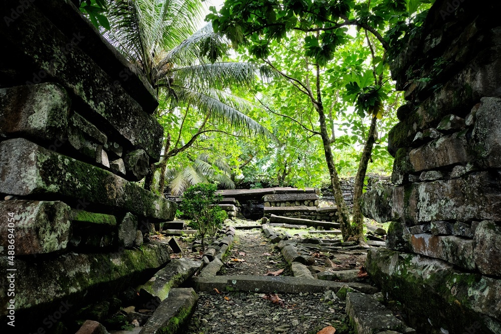 Exploring the inner buildings of ancient ruins at archaeological site ...