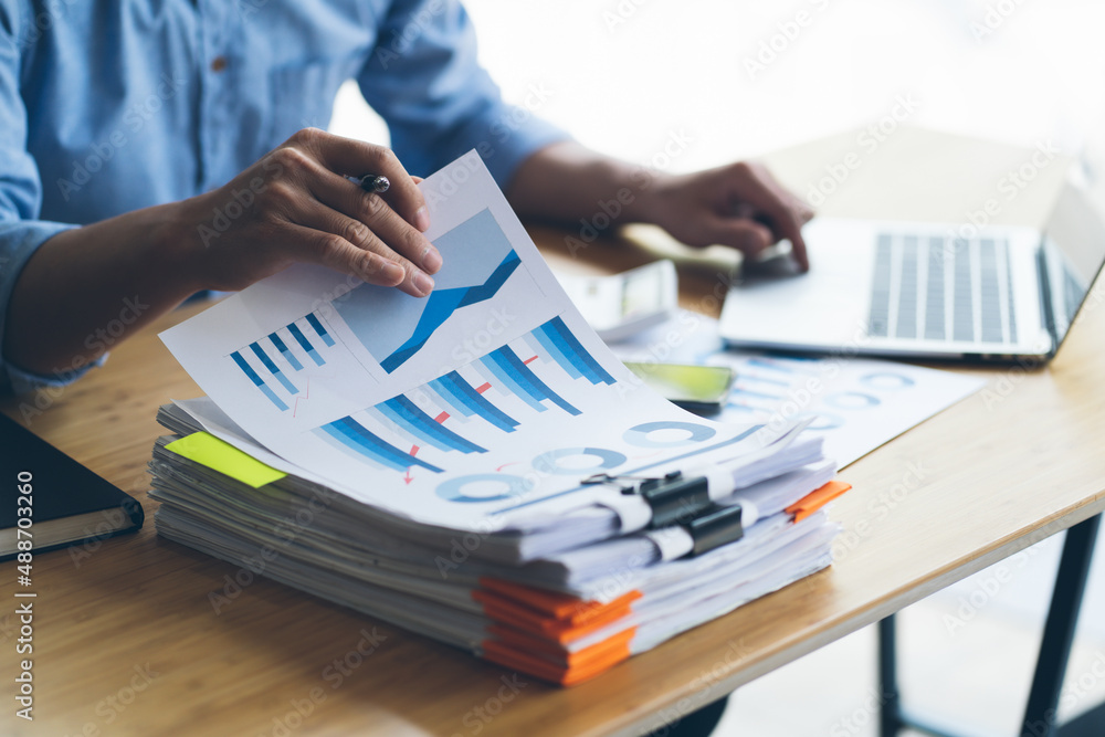 Work from Home, Businessman hands working in Stacks of paper files for ...
