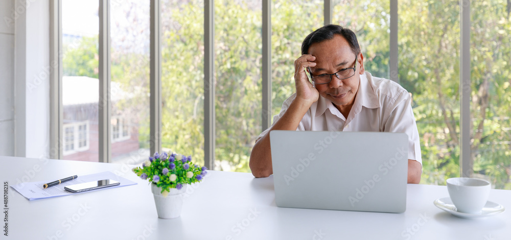 Asian old senior stressed depressed tired male businessman in business ...