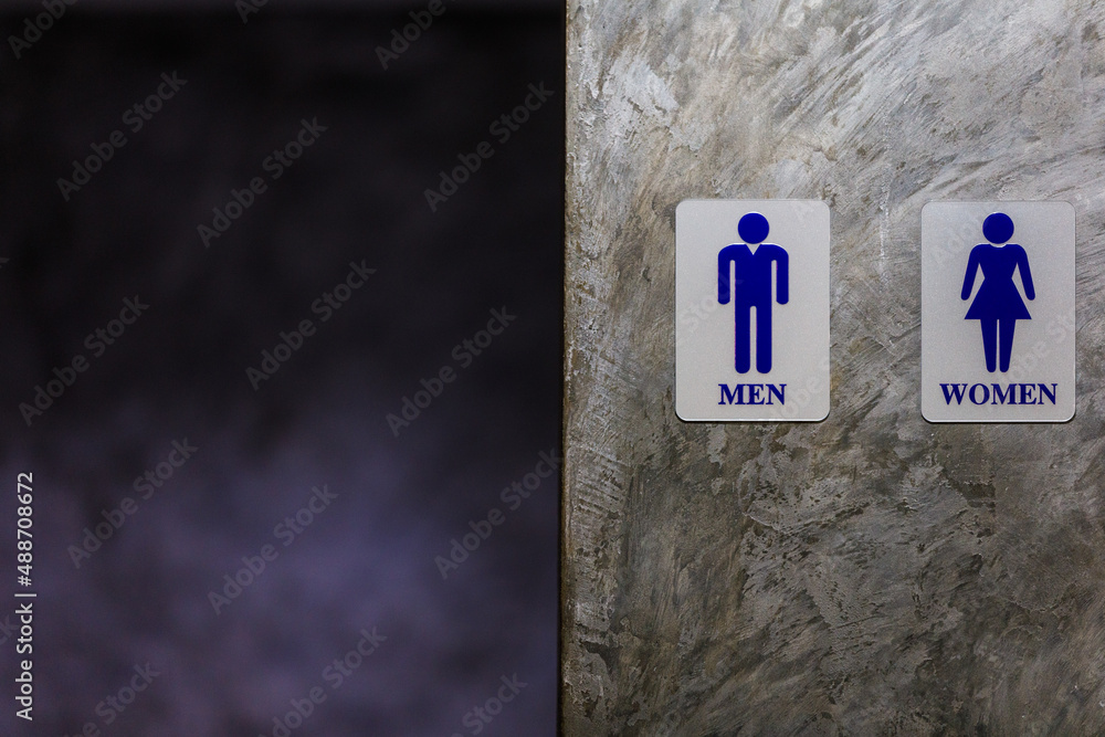 Closeup shot clean plastic acrylic square toilet sign symbol stuck on ...