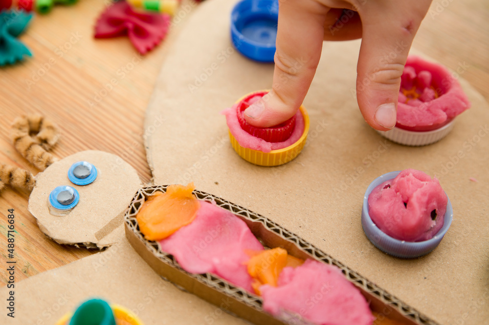 DIY toy for actively explore different materials. Tool for pre-school ...