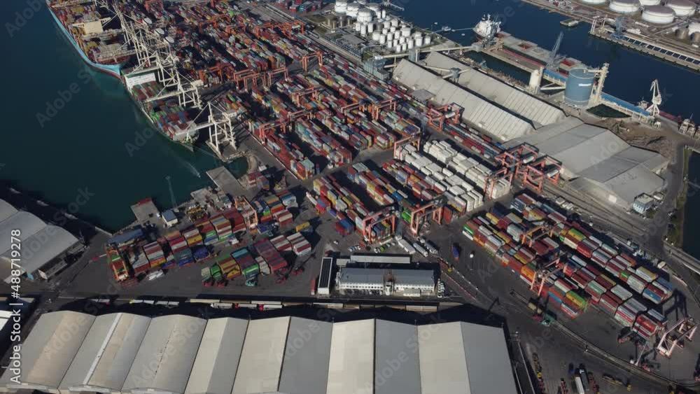 Container ship loading and unloading in deep sea port, Aerial view of ...