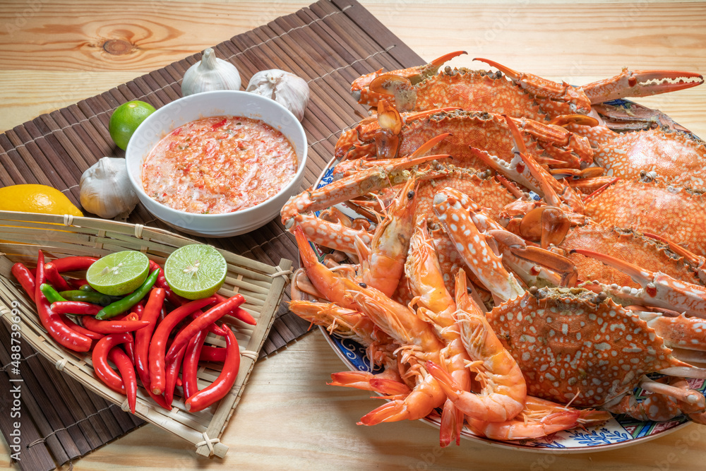 Seafood dish, steamed and cooked blue crab, served with Thai spicy and ...