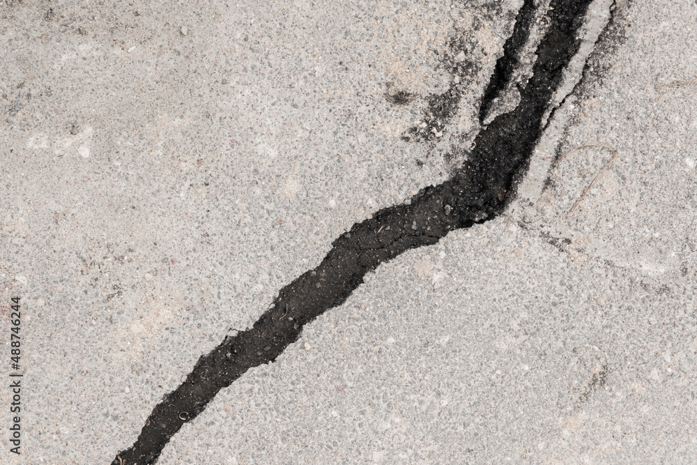Large crack stratification separation of asphalt road broken damaged ...