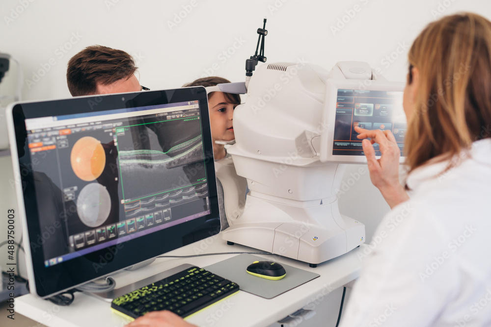 child having eye examination.digital retina scan Stock Photo | Adobe Stock
