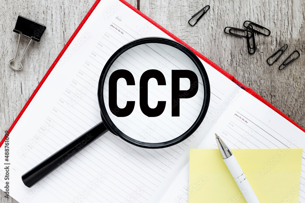 Business Acronym CCP Critical Control Point. text on a magnifying glass ...