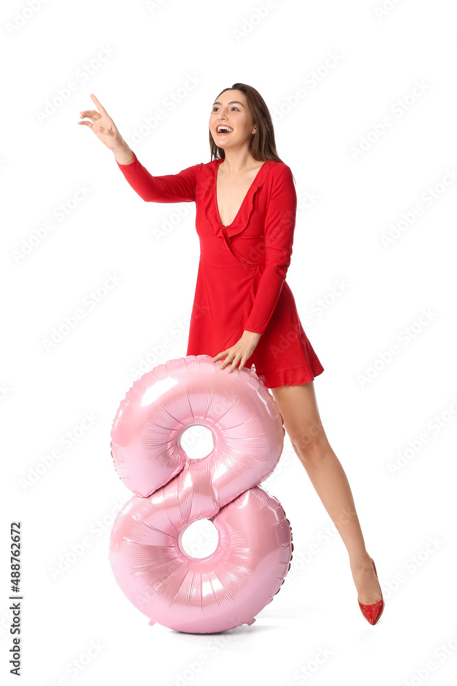 Pretty young woman with balloon in shape of figure 8 on white ...