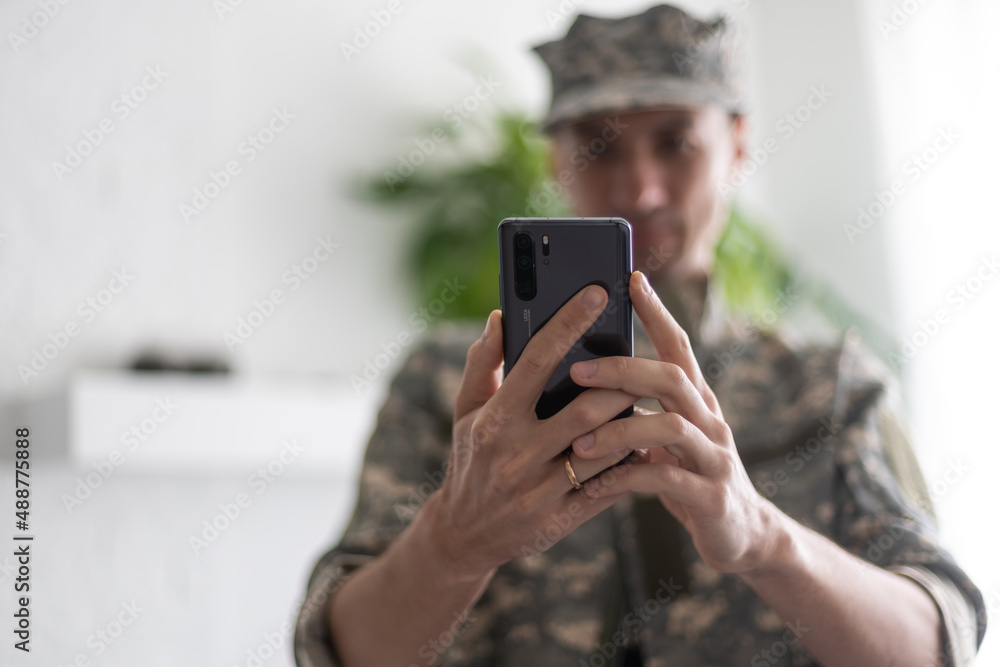 military man with phone, cyber police, information war Stock Photo ...