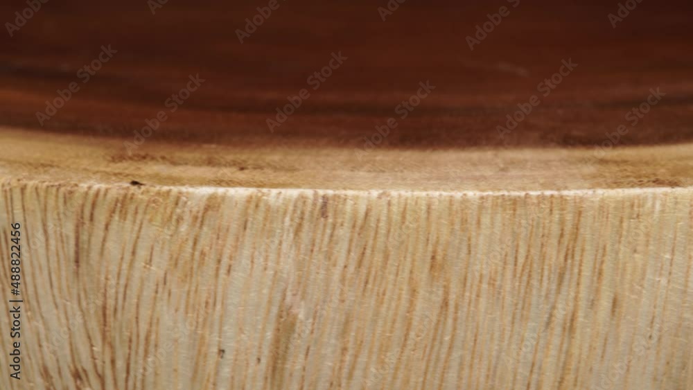 Treated dried wood log with age rings slowly rotating. Wooden tree ...