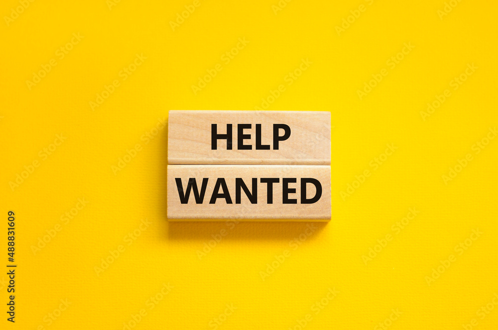 Help wanted and support symbol. Concept words Help wanted on wooden ...