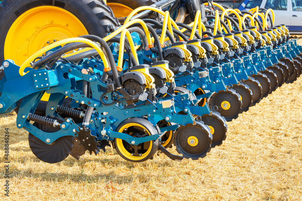 The wheel mechanism of a multi-row seeder as a hitch to a tractor on ...