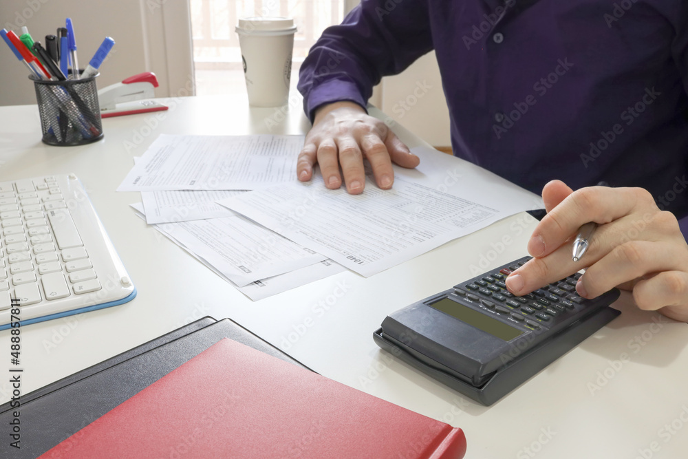 Concept of man calculate domestic bills at home. Financial businessman ...