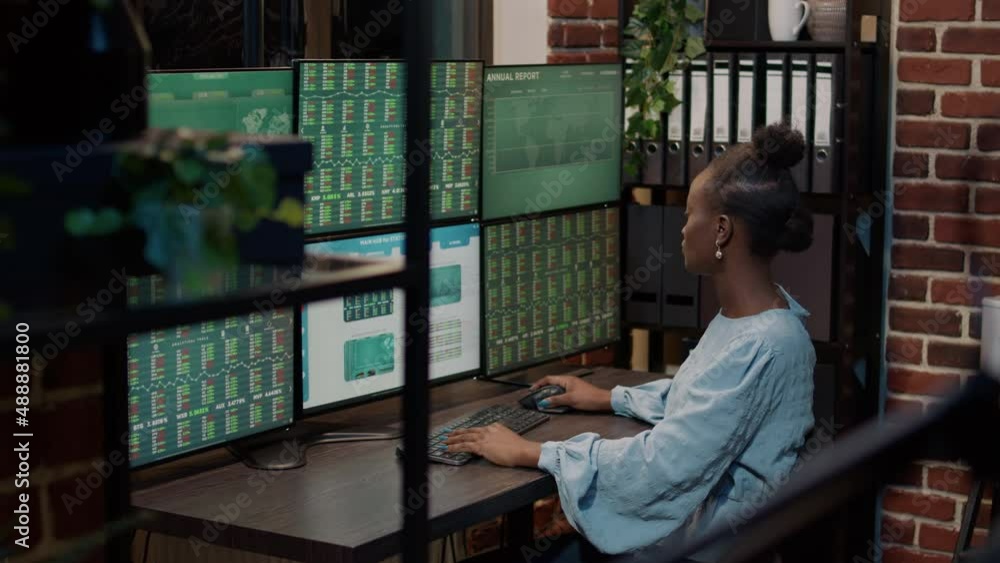 African american woman analyzing stock market investment and sales ...