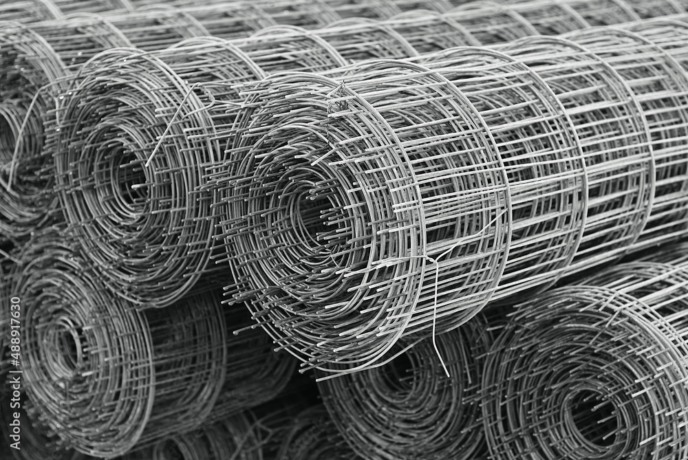 A pile of roll wire mesh on ground of construction site unit ...