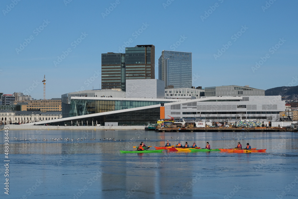 Harbor promenade with shops, restaurants, city hall and modern ...