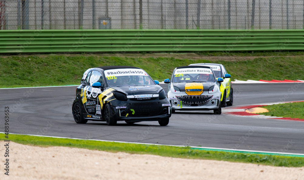 Group of Smart electric racing mini car on asphalt race track ...